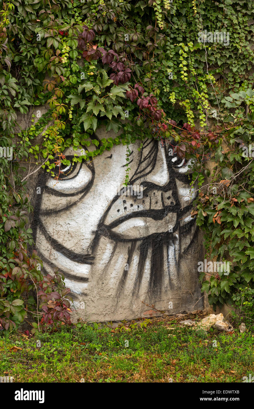 Sad face graffiti on wall hi-res stock photography and images - Alamy