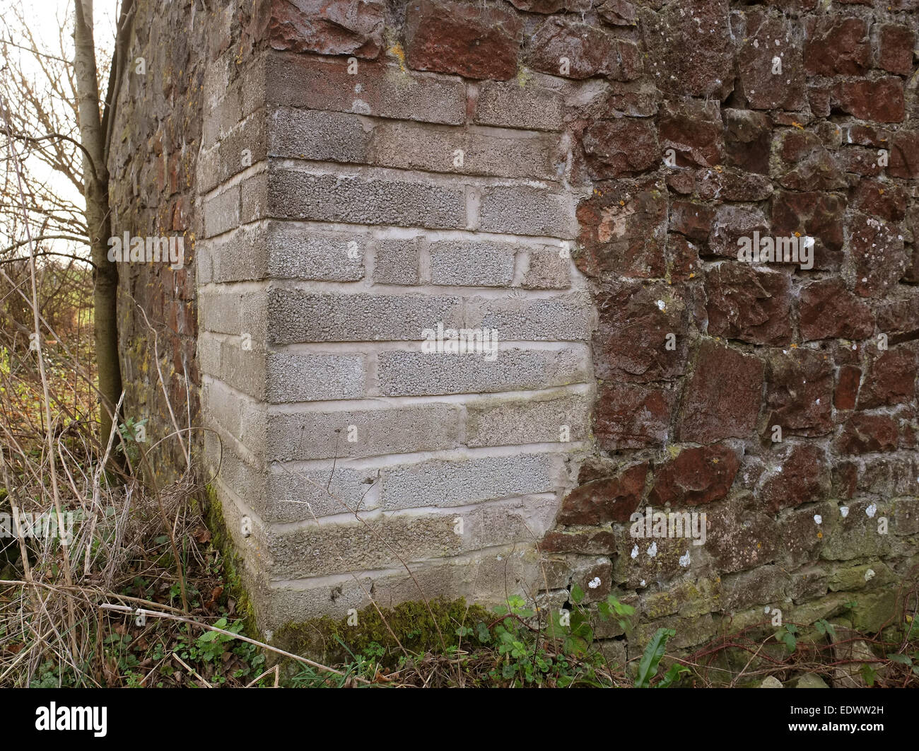 Corner of an old stone barn repaired with modern blockwork, 10th ...