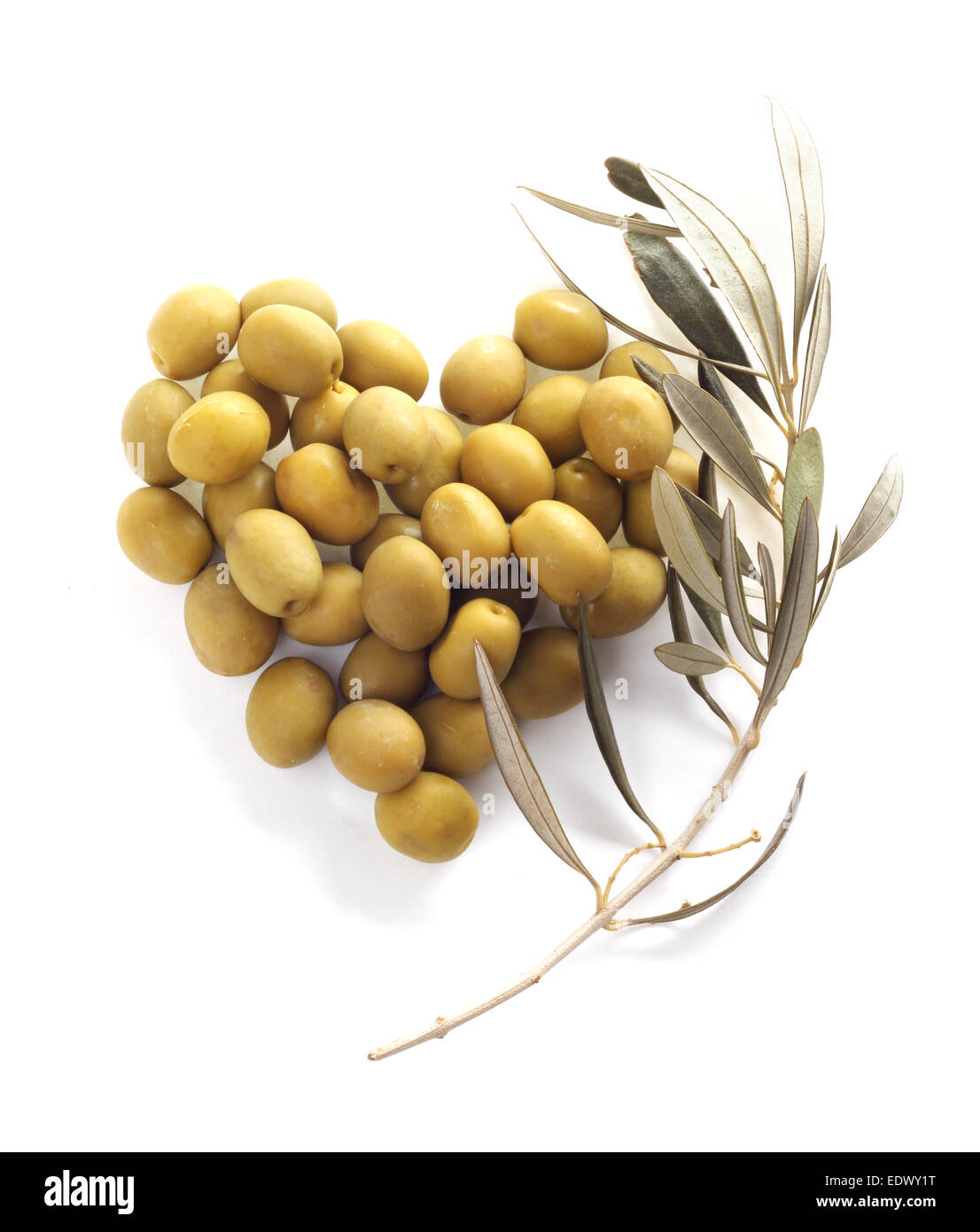 Olives in heart shape isolated on white background Stock Photo - Alamy