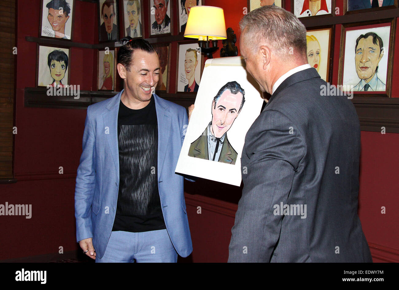 Alan Cumming receives his portrait at famed theatre district eatery ...