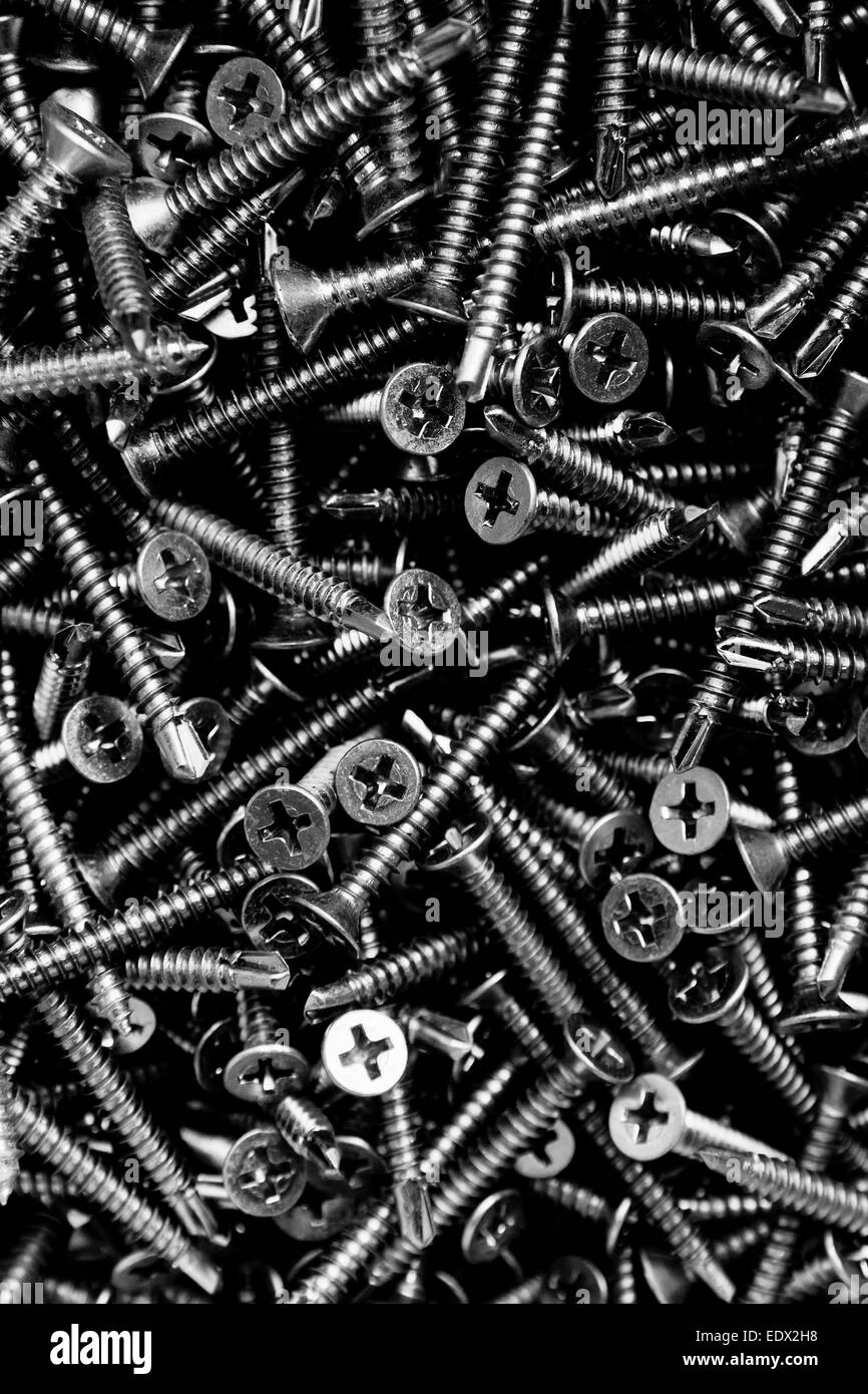 Screws background texture Stock Photo - Alamy