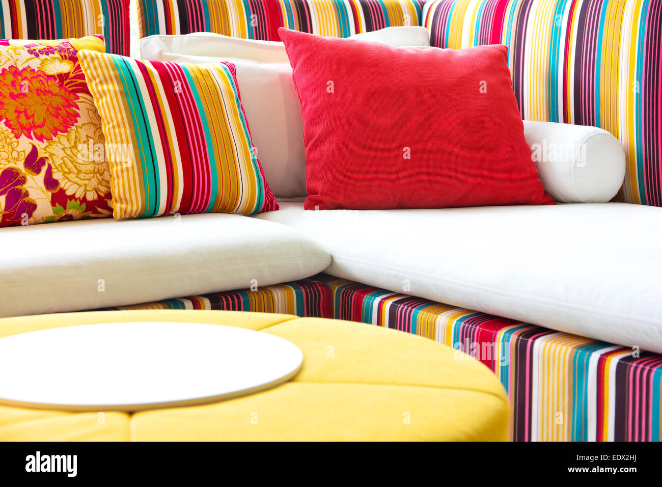 Colorful cushions in sofa Stock Photo - Alamy