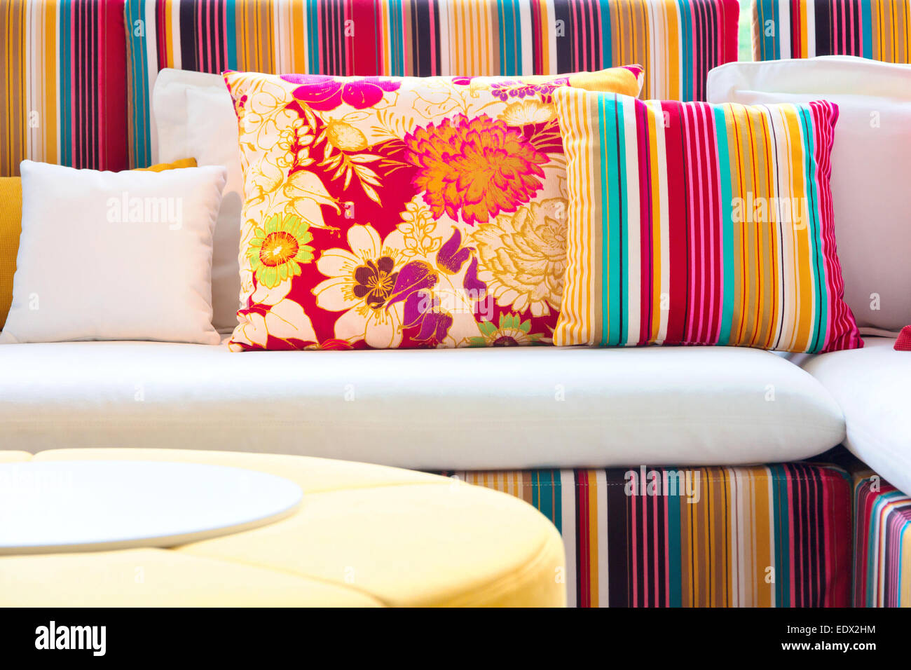 Colorful cushions in sofa Stock Photo - Alamy