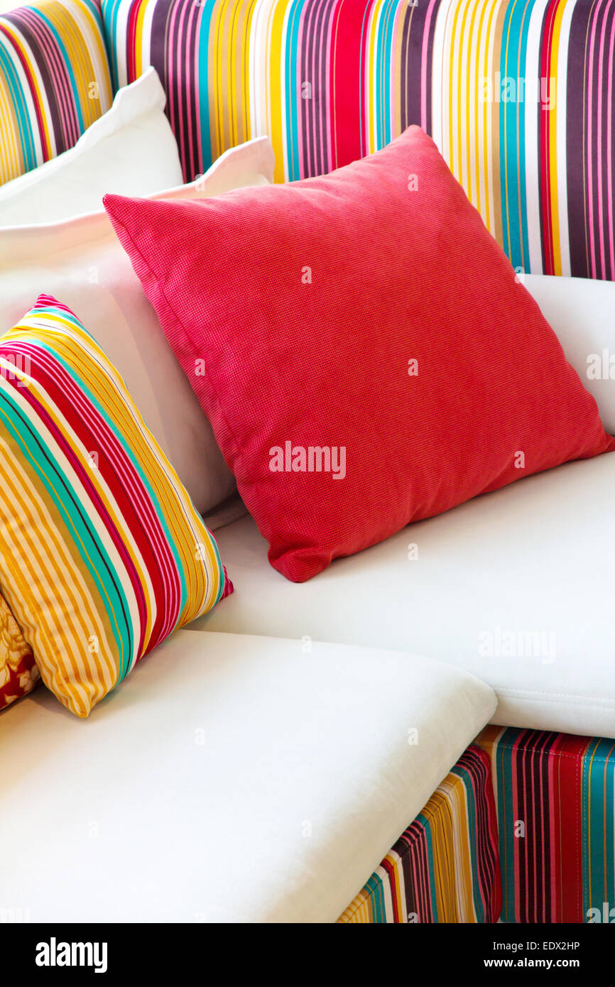 Colorful cushions in sofa Stock Photo - Alamy