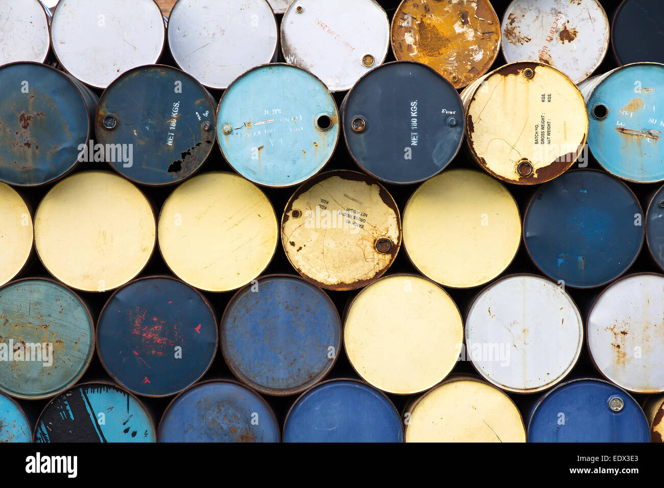 stack of old fuel tanks background Stock Photo - Alamy