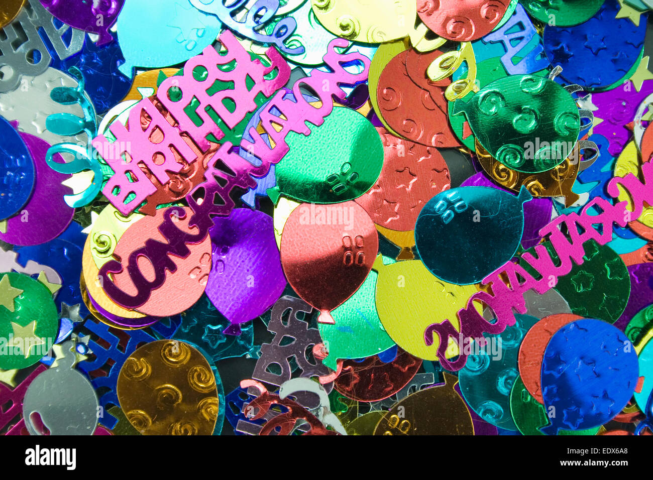 Close up shot of party table confetti decorations Stock Photo - Alamy