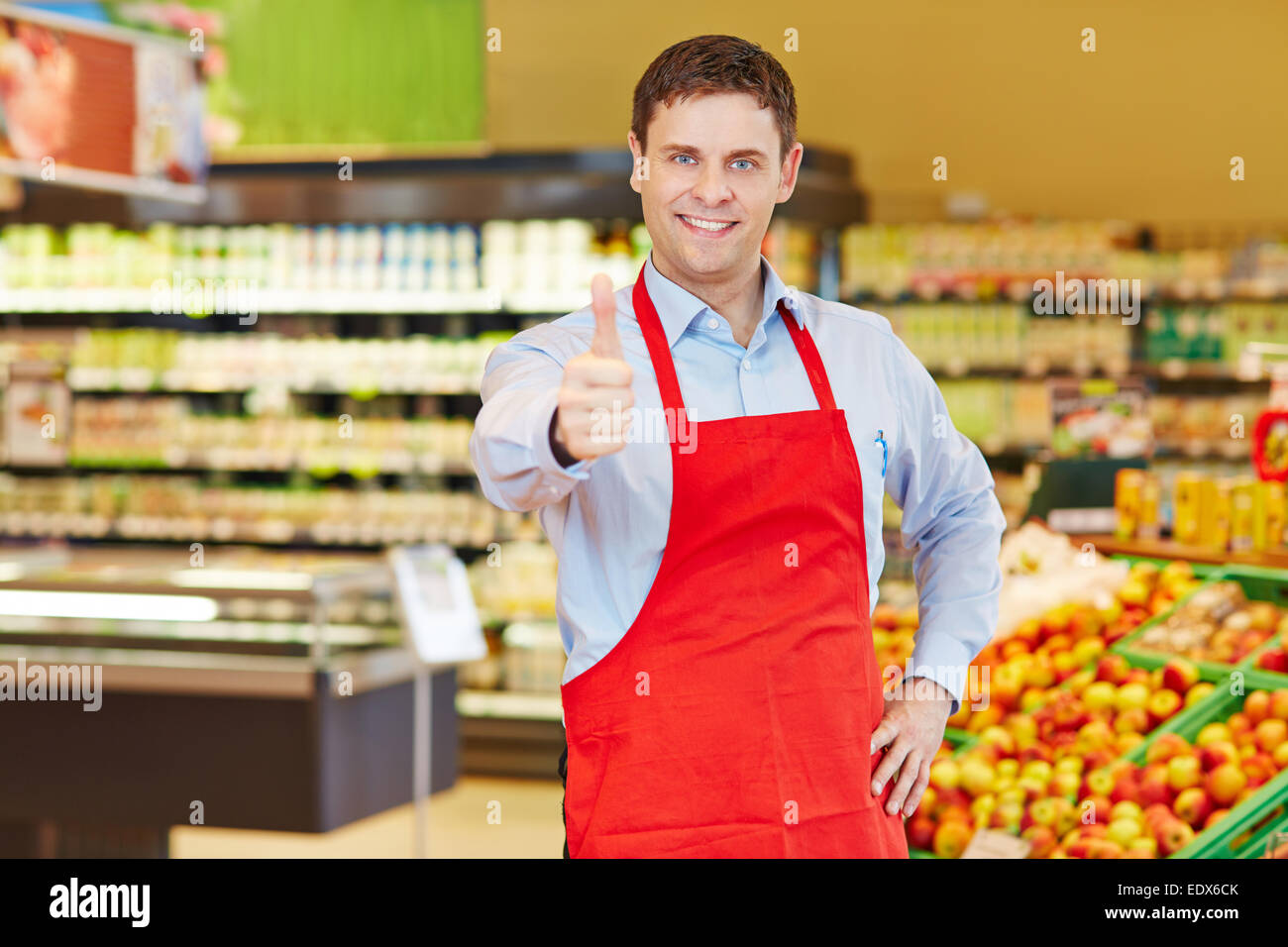 Happy salesman holding organic hi-res stock photography and images - Alamy