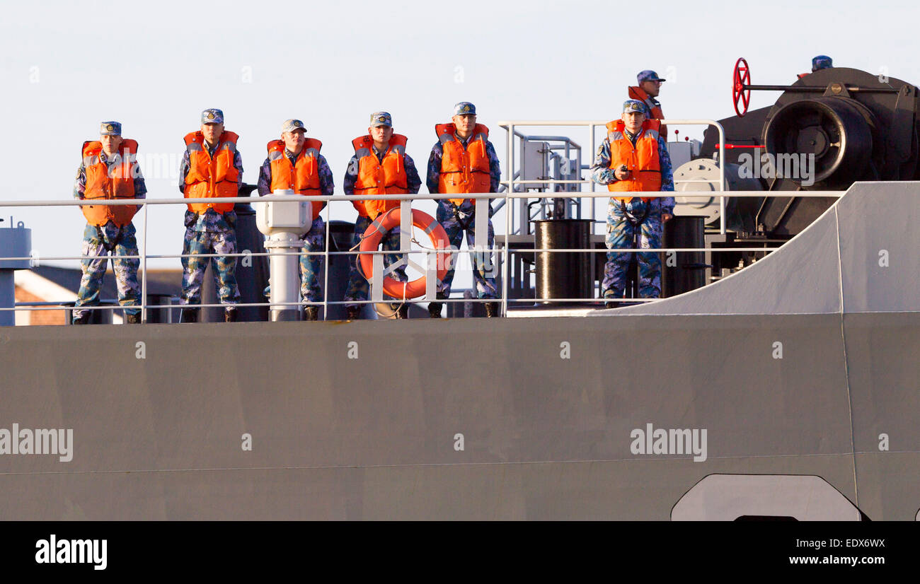 Sailors aboard the Chinese Naval replenishment ship Chaohu line up as ...
