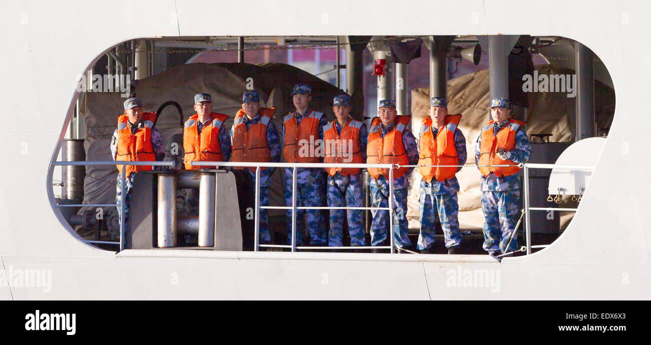 Sailors aboard the Chinese Naval replenishment ship Chaohu line up as ...