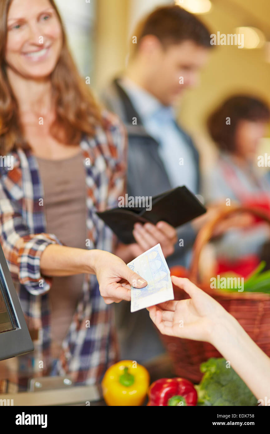 Woman grocery shopping smile bill hi-res stock photography and images ...