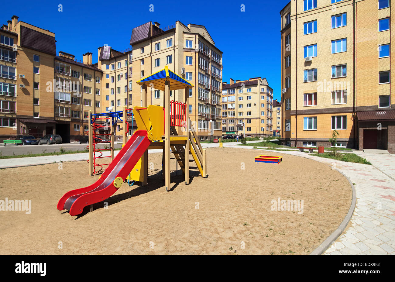Children's playground in the new neighborhood Stock Photo - Alamy
