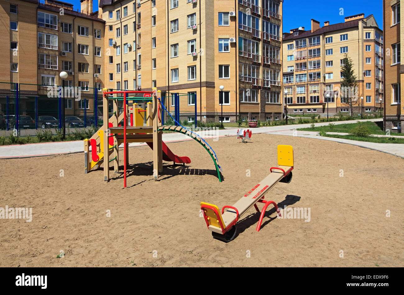 Children's playground in the new neighborhood Stock Photo - Alamy