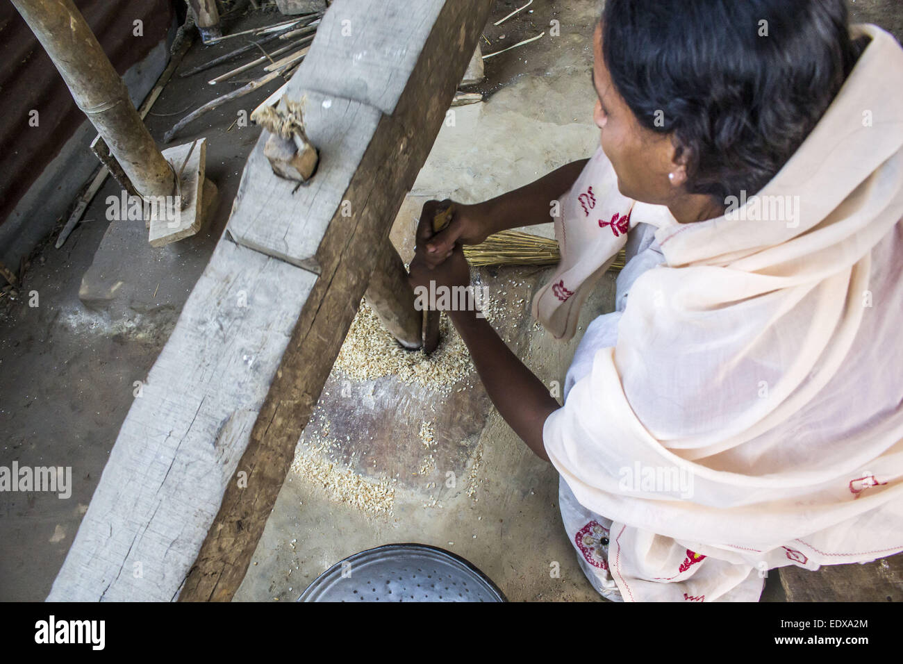 Sivasagar, Assam, India. 11th Jan, 2015. An Assamese woman prepares ...