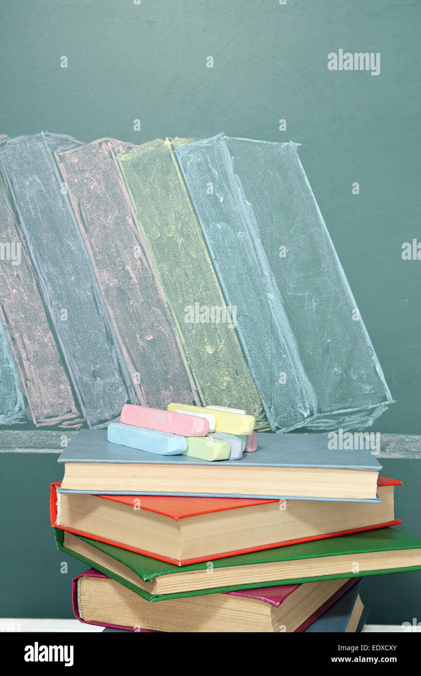 Chalk drawing of books and real books Stock Photo - Alamy