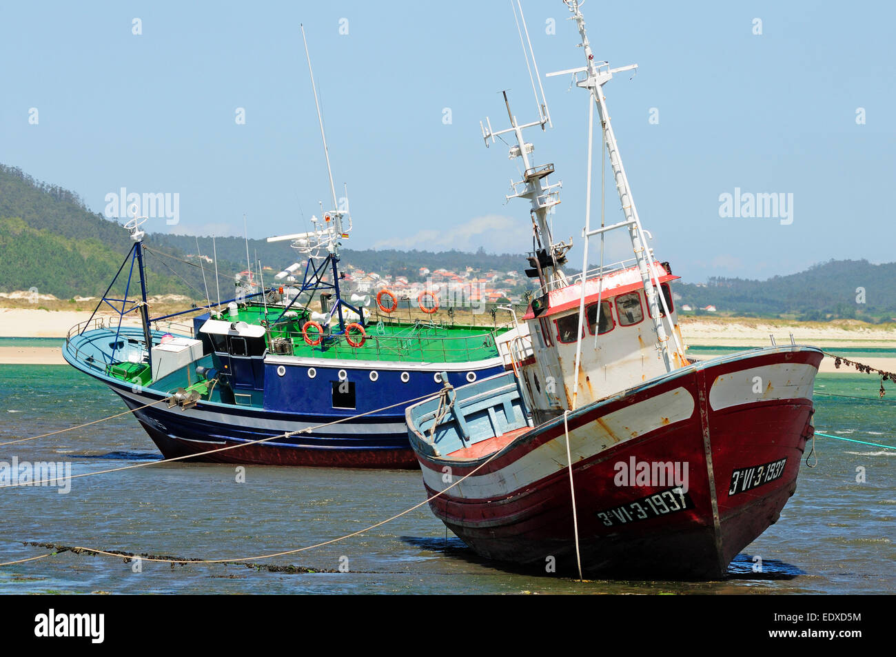 Stranded ships for repair. A Insua inlet, Ponteceso, Galicia, Spain ...