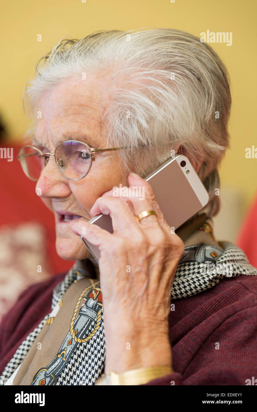 grandmother calling by phone for business Stock Photo - Alamy