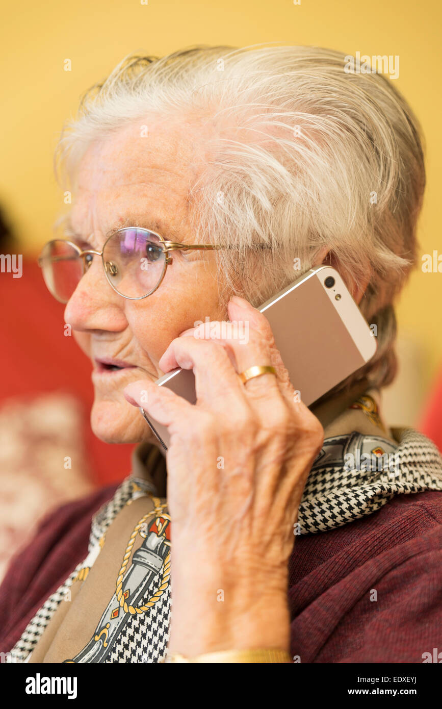 grandmother calling by phone for business Stock Photo - Alamy