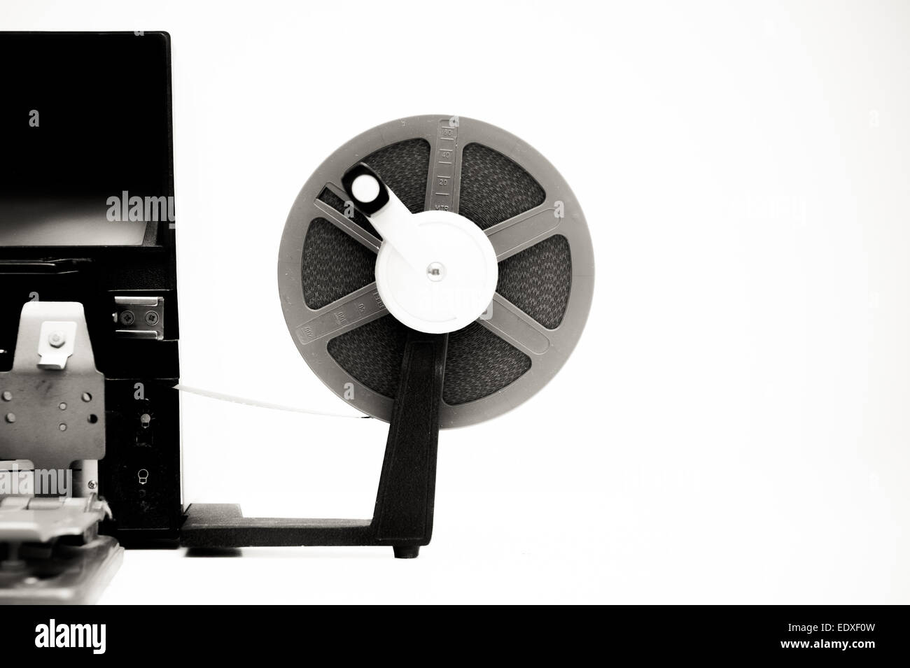 A vintage 8mm movie editing desktop in black and white with editing ...