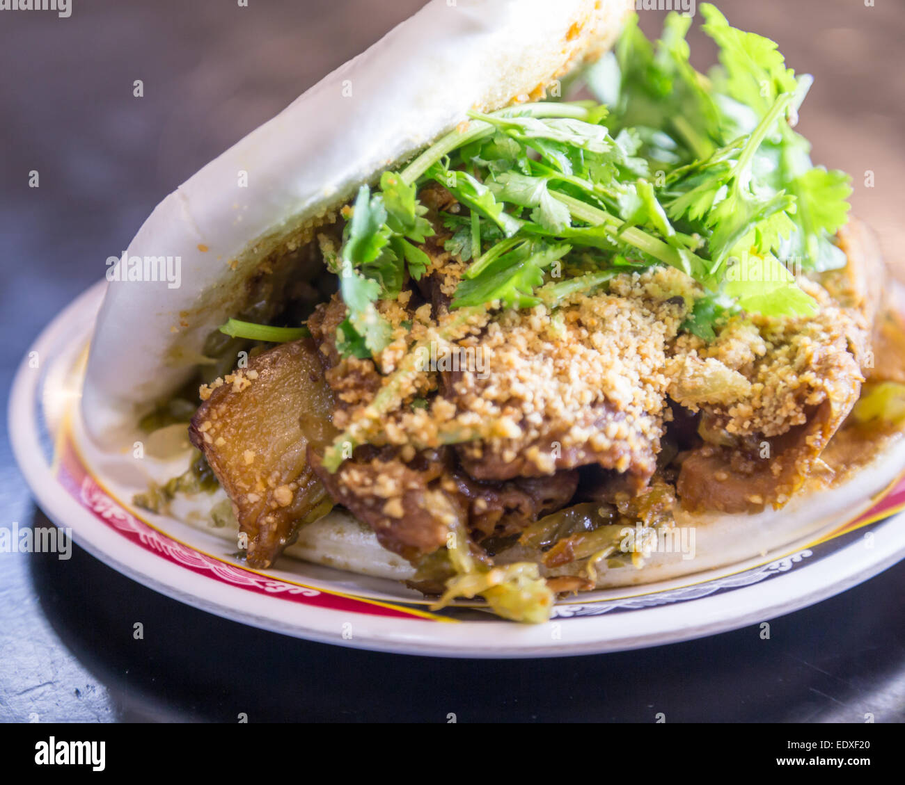 Traditional Taiwanese guo bao meat on a bun dish Stock Photo - Alamy