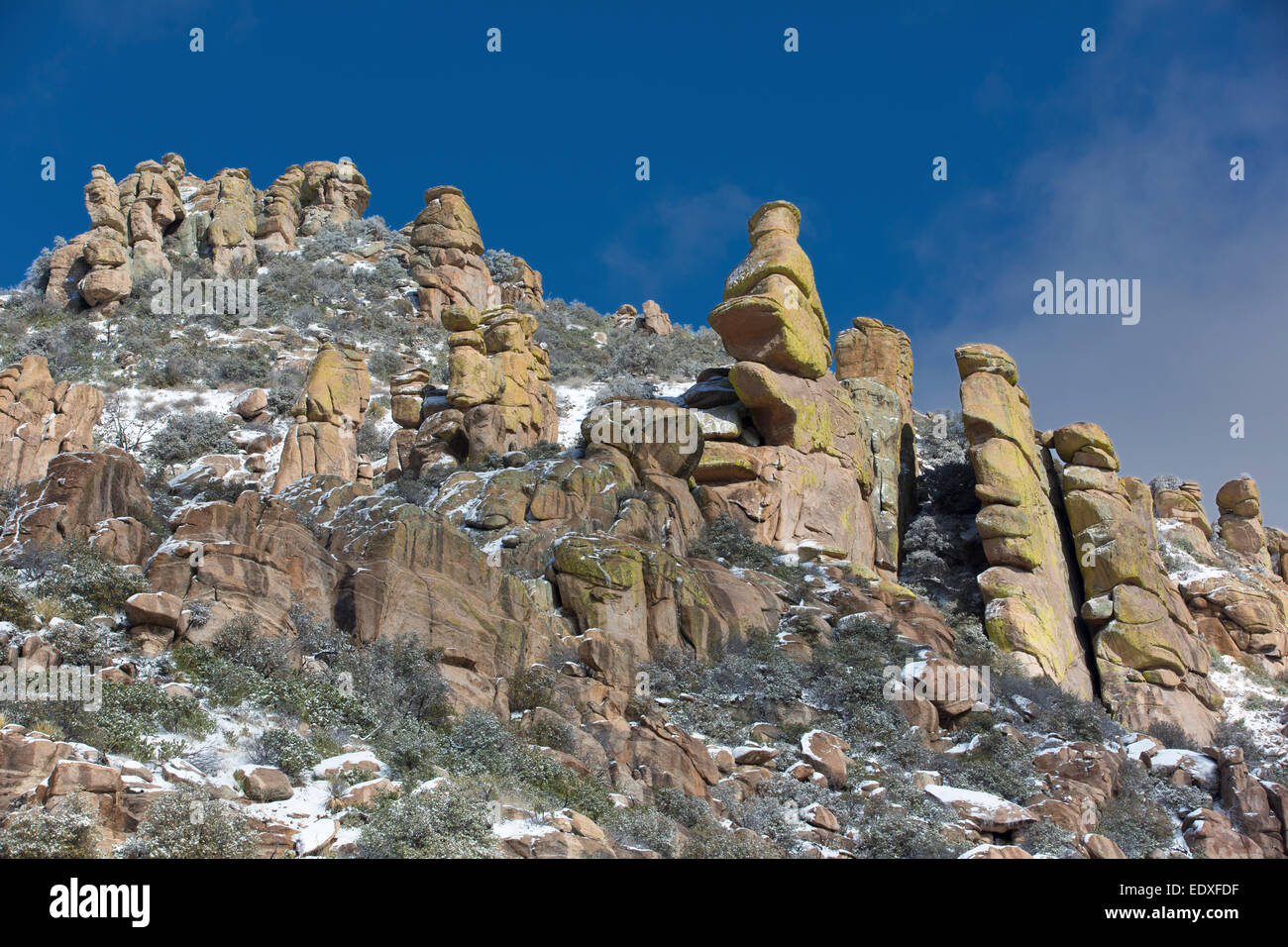 Hoodoo rock formations on Mt. Lemmon Scenic Byway are touched with snow ...
