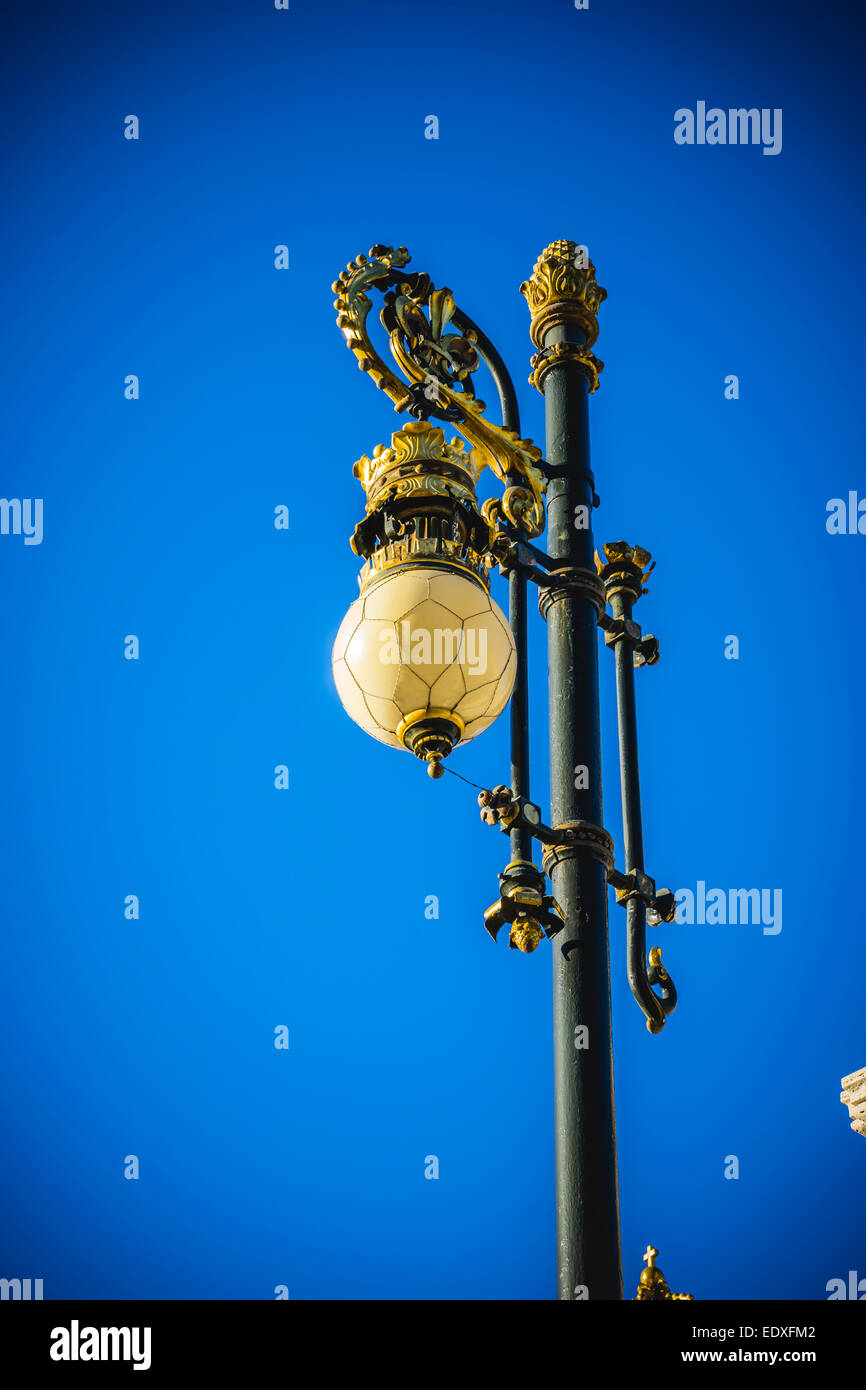 Street lamp, Royal Palace of Madrid, located in the area of the ...