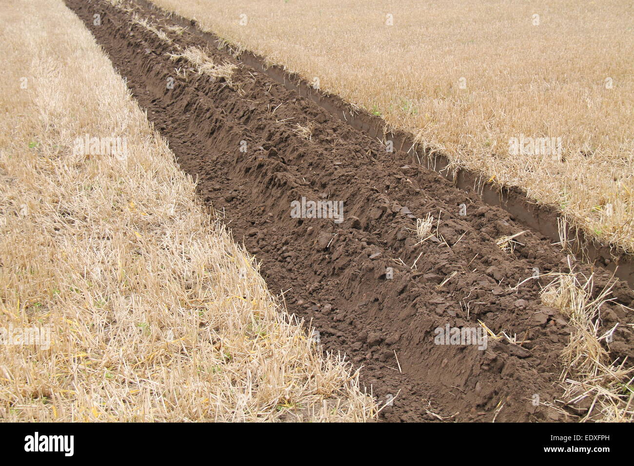 Ploughed Deep Furrows on a Farmers Field Stock Photo - Alamy