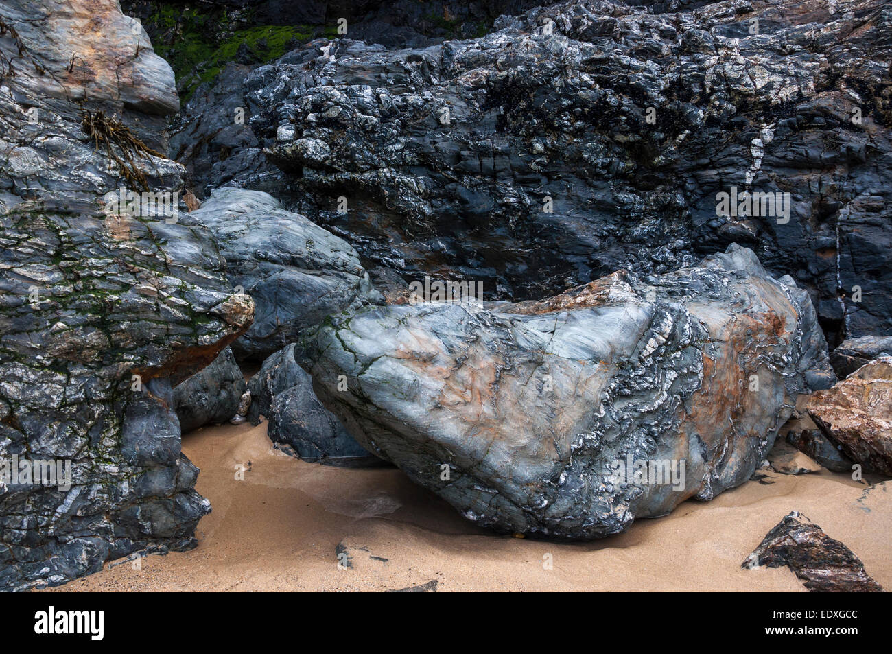 Interesting geology in the rocks at Perranporth beach in Cornwall Stock ...