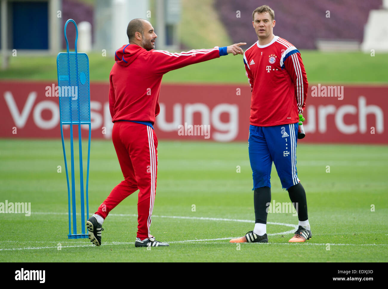 Doha, Qatar. 11th Jan, 2015. Munich's head coach Pep Guardiola (L ...