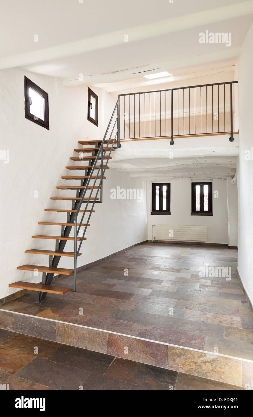 interior rustic house, large room with staircase Stock Photo - Alamy