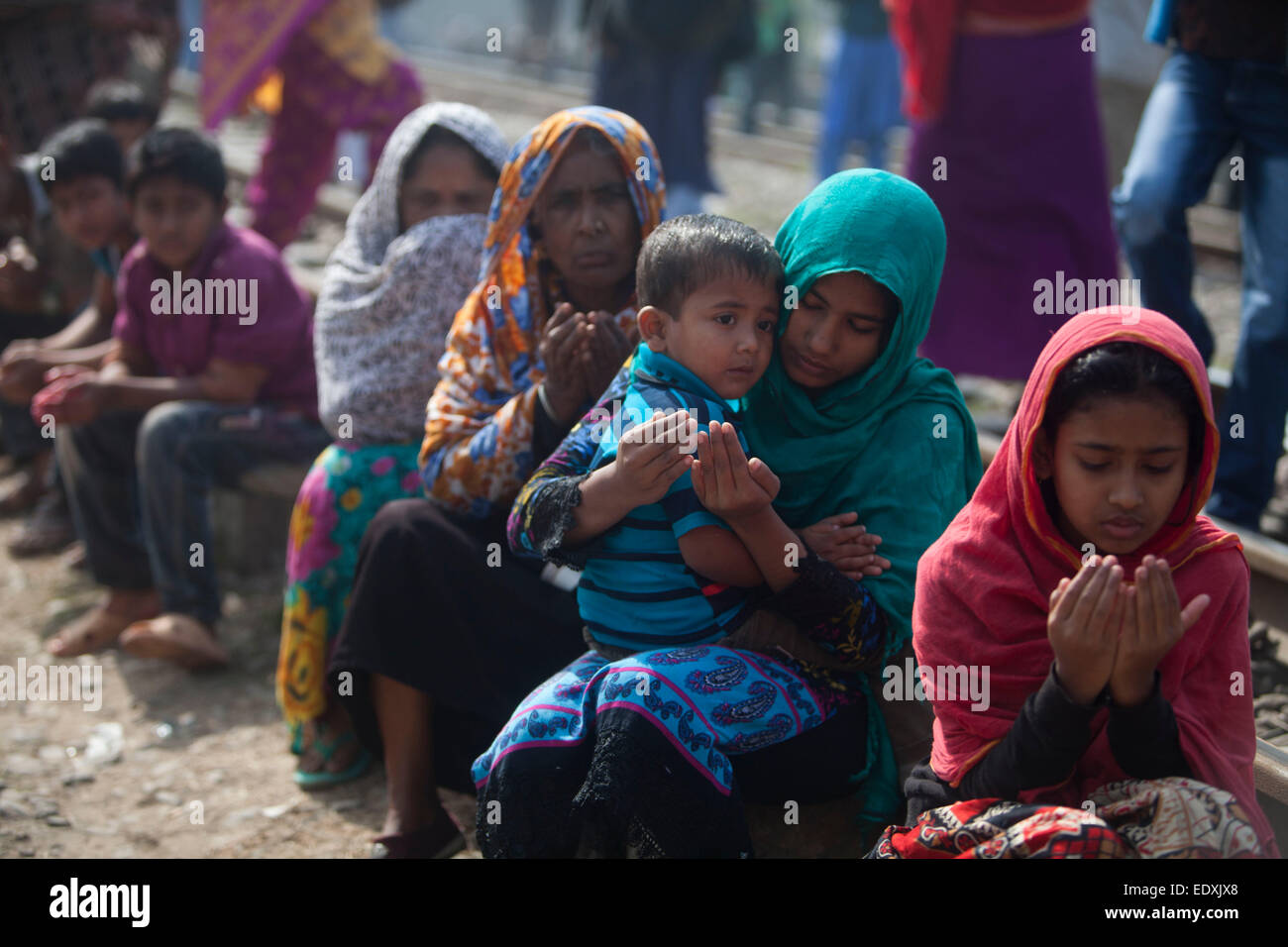 Tongi, Bangladesh. 11th Jan, 2015. Bangladeshi Muslim devotees attend ...
