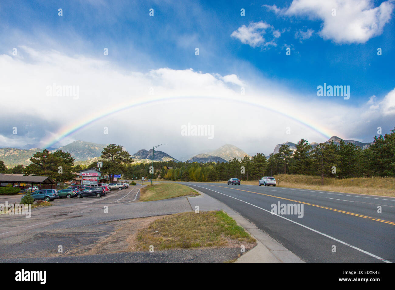 Full rainbow over Rocky Mountain National Park in Estes Park Colorado ...