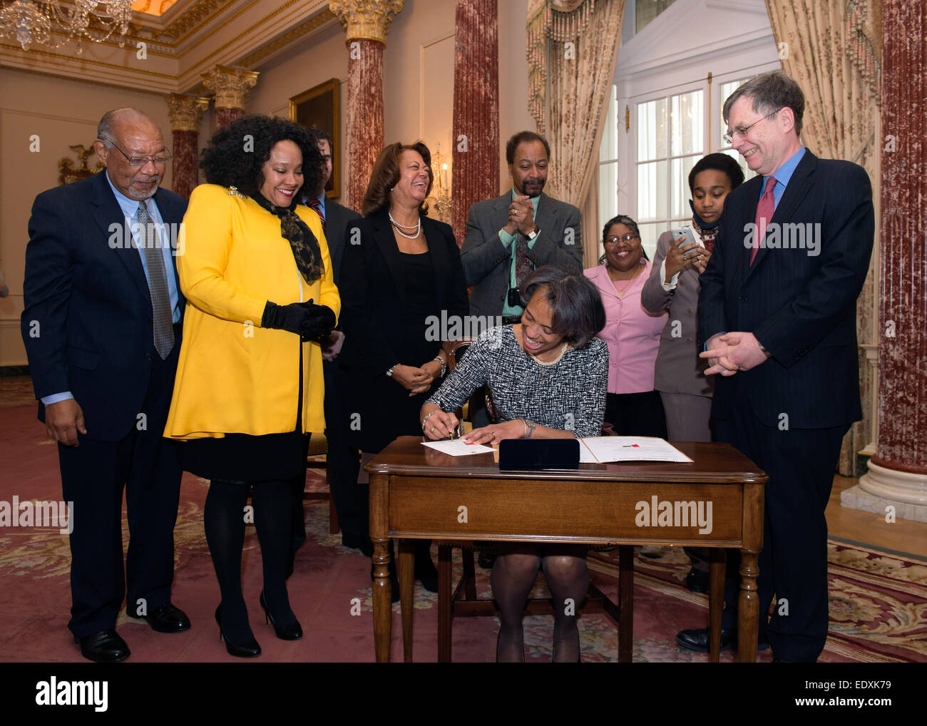 With her family and Under Secretary for Management Patrick Kennedy ...