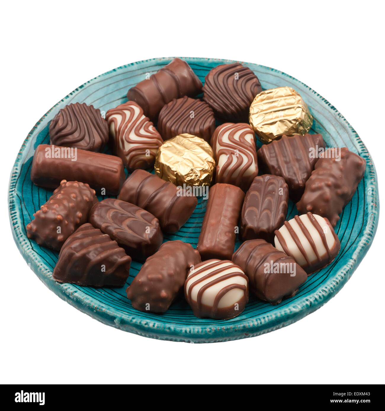 Plate of chocolates isolated on white background Stock Photo - Alamy