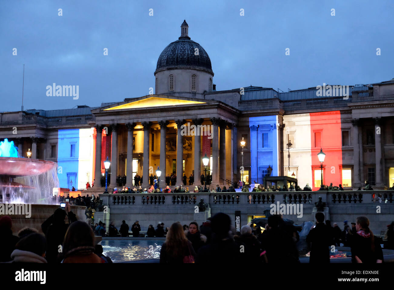 The national gallery is illuminated in the French flag colours Stock ...