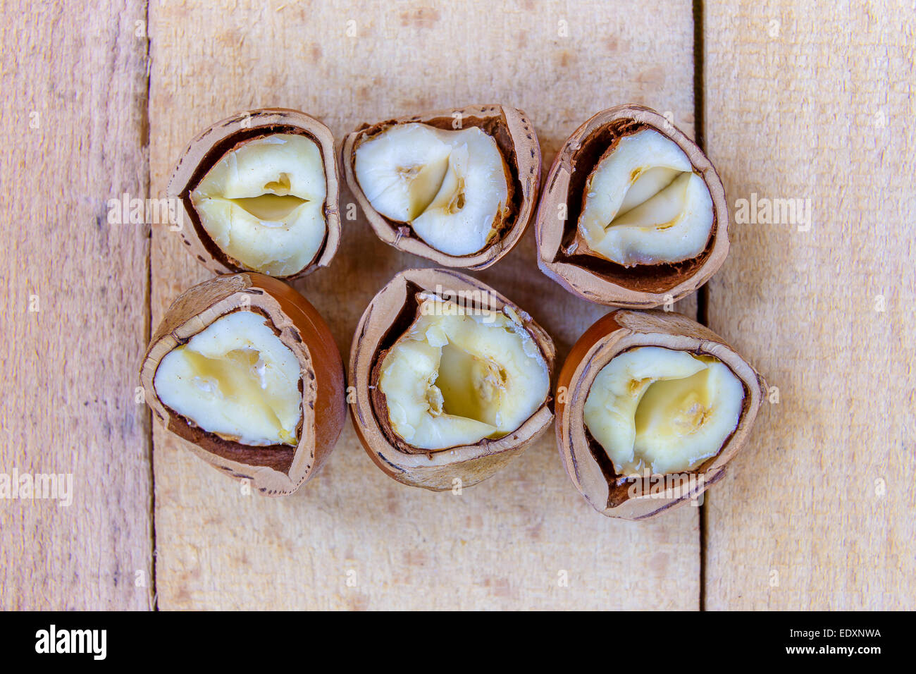 Chopped nuts on wooden boards Stock Photo - Alamy