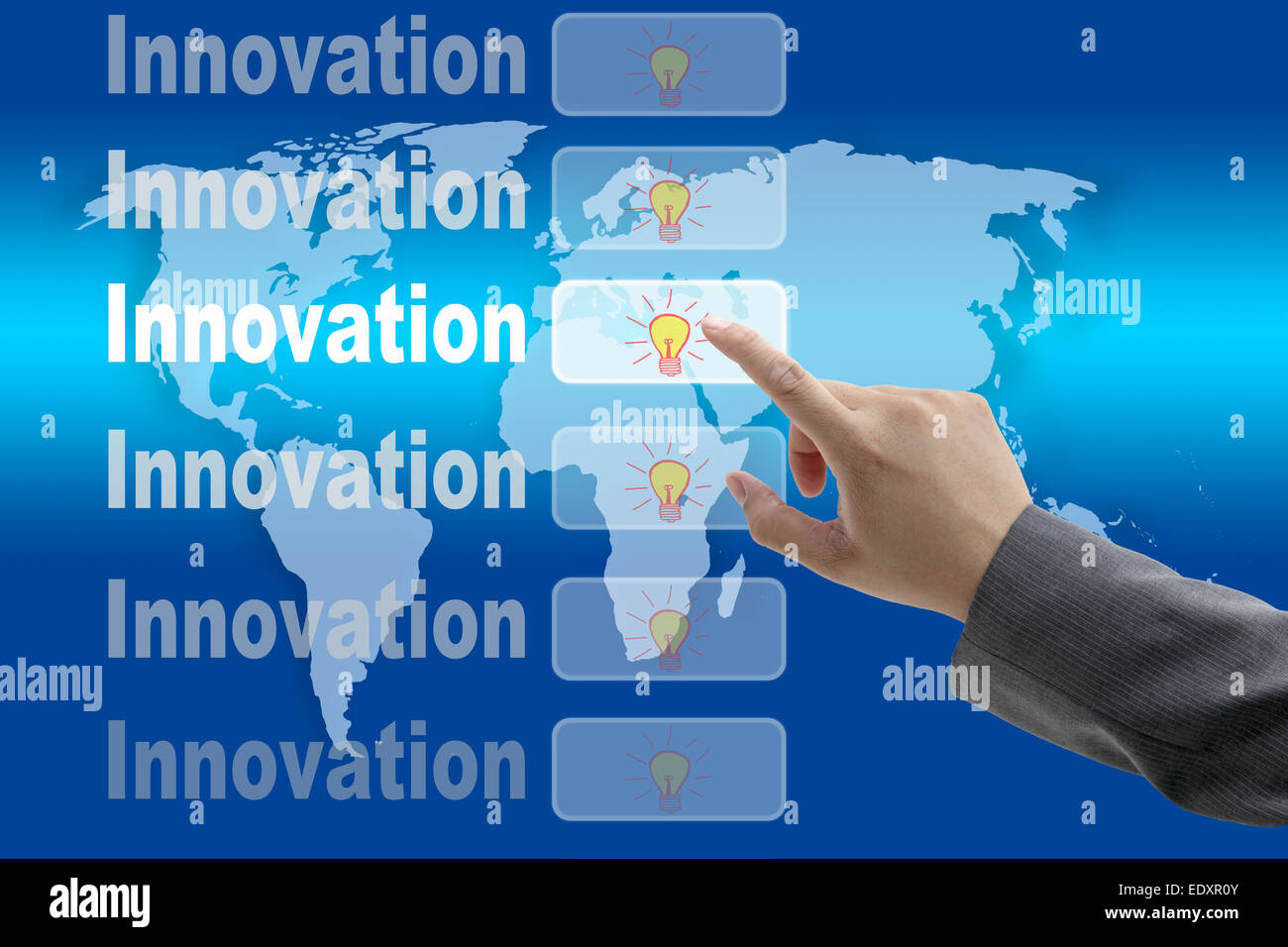 male business hand pushing on Innovation button with world map ...