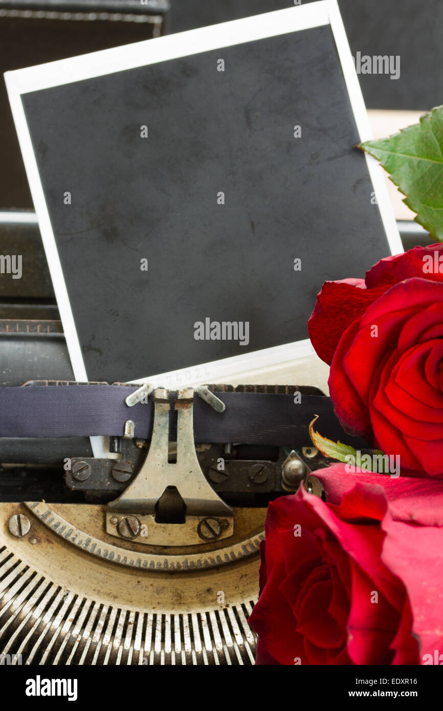 red rose on typewriter Stock Photo - Alamy