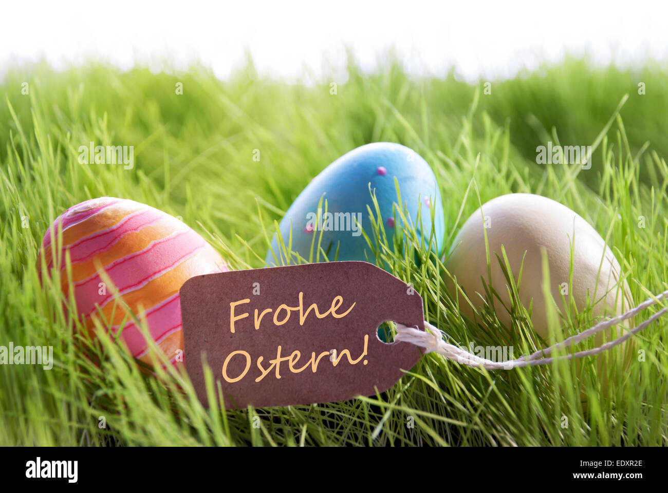 Colorful Easter Background With Three Easter Eggs And Label With German ...