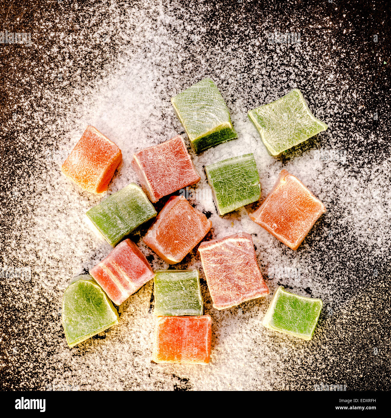 Random pieces of Turkish Delight on black background Stock Photo - Alamy