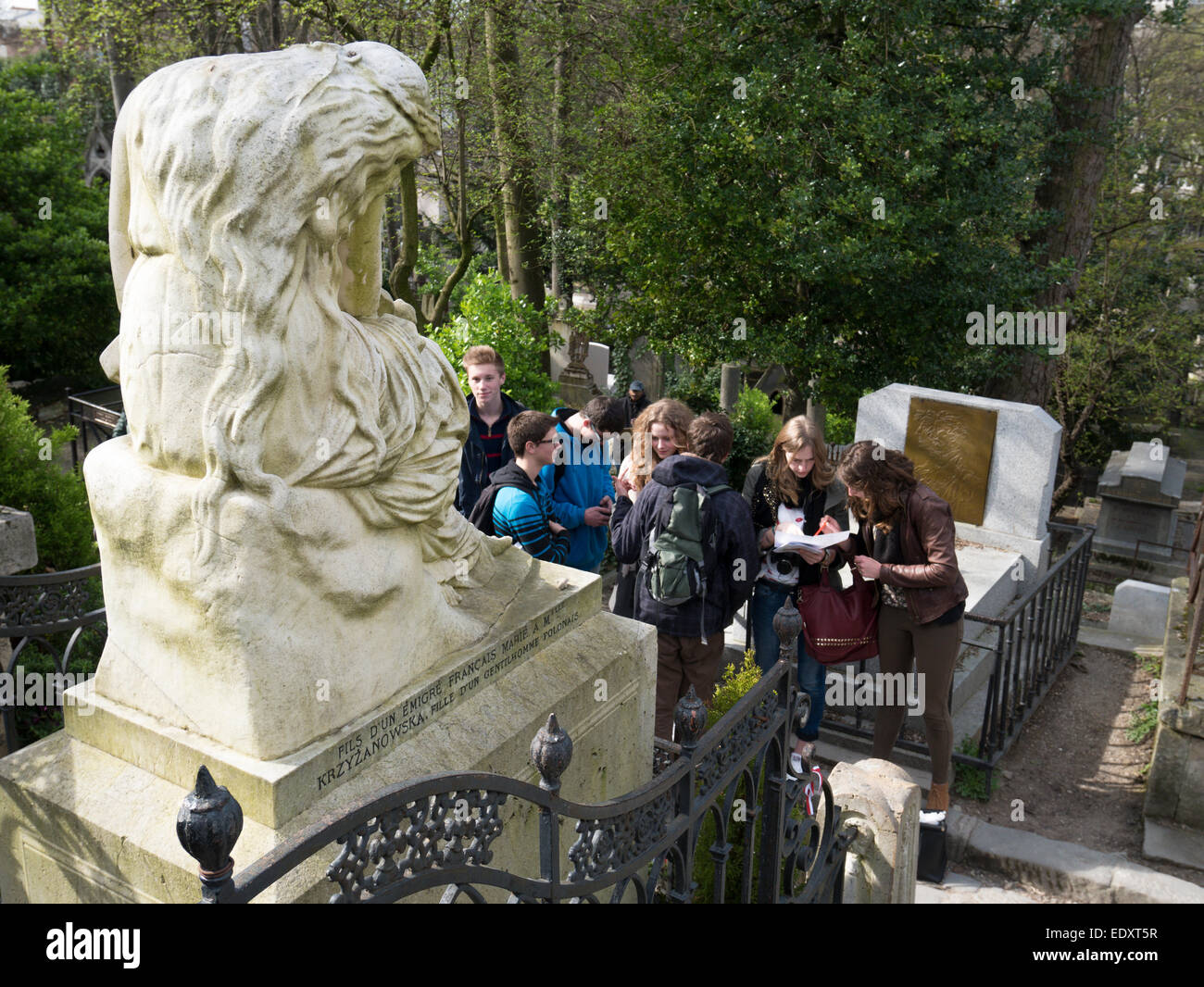 Students at the grave of Frederic Chopin in Pere Lachaise cemetery in ...