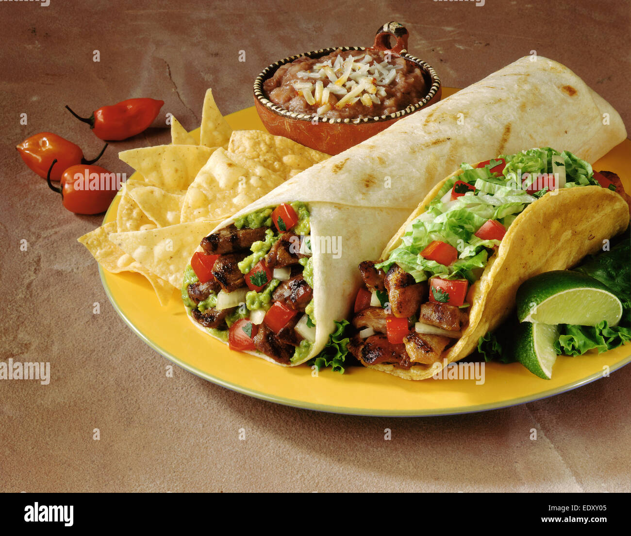Chicken taco and burrito Stock Photo - Alamy