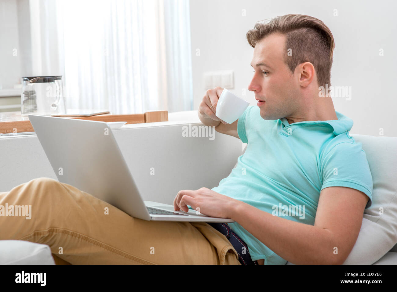 Man working with laptop Stock Photo - Alamy