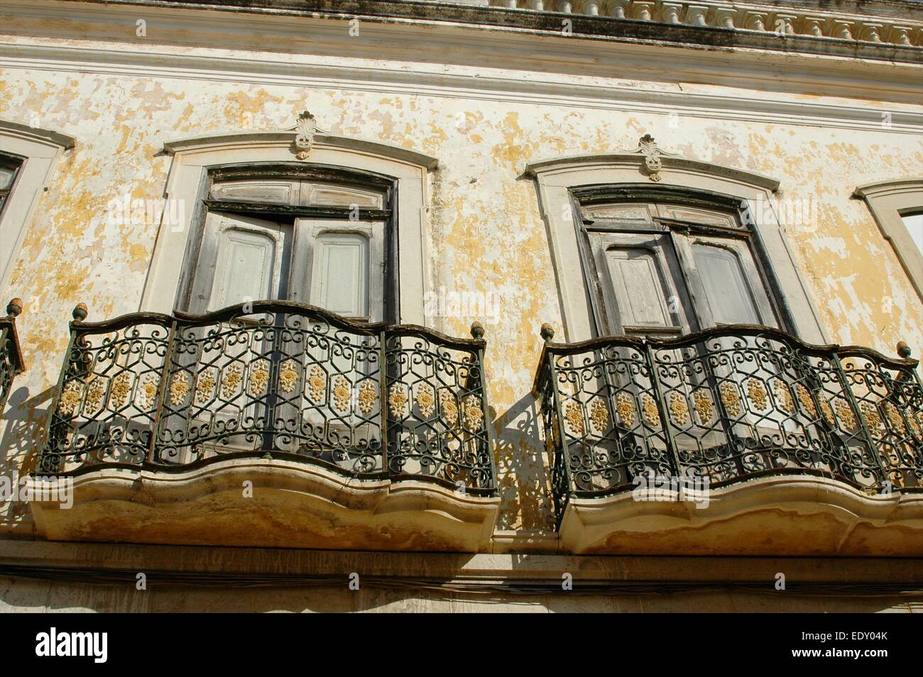 Old balcony and windows at Olhao, Algarve, Portugal Stock Photo - Alamy
