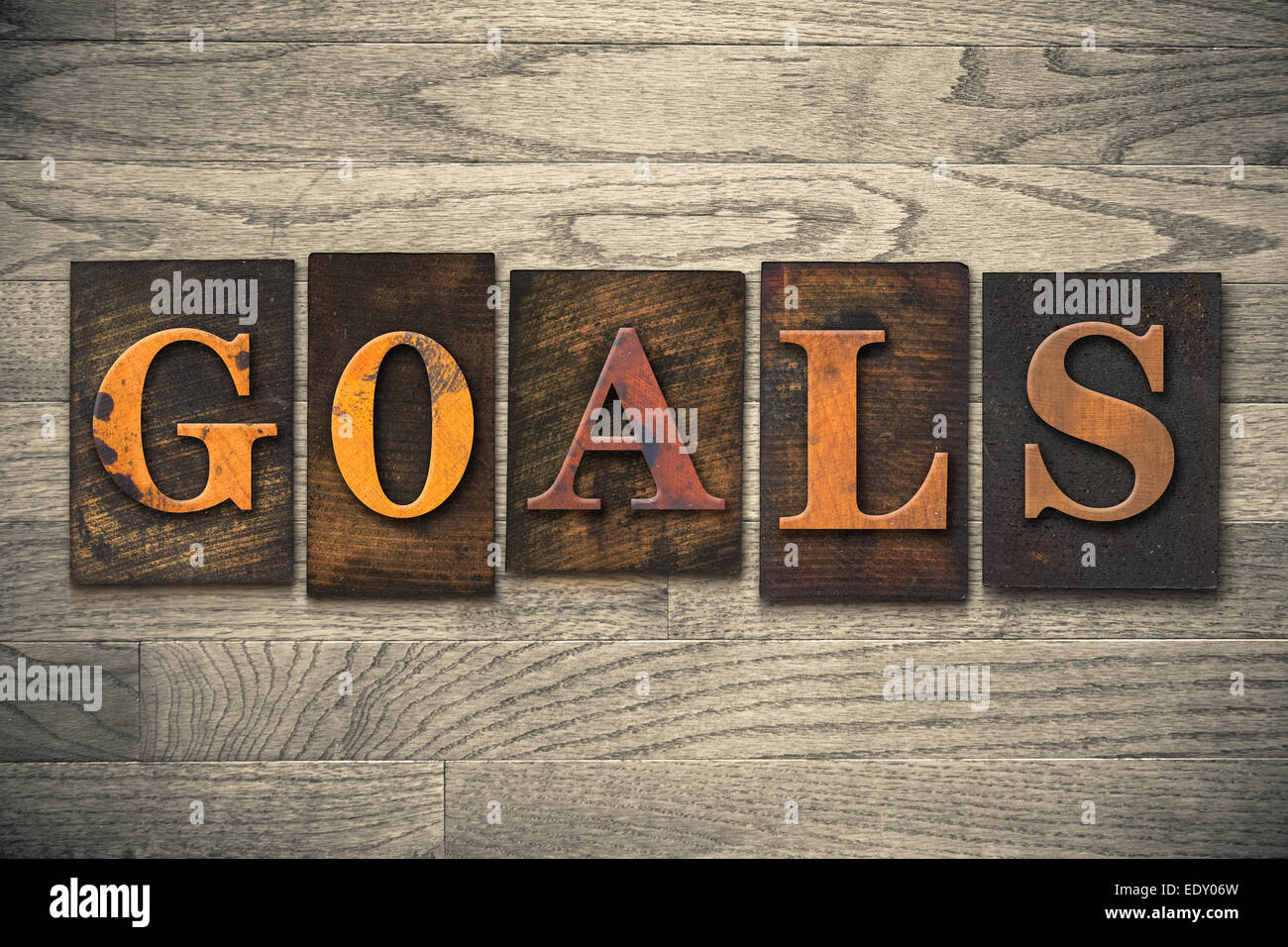 The word "GOALS" written in wooden letterpress type Stock Photo - Alamy