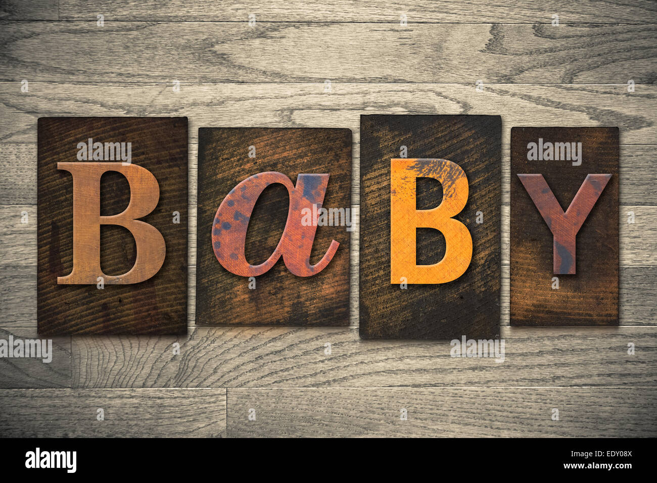 The word "BABY" written in wooden letterpress type Stock Photo - Alamy