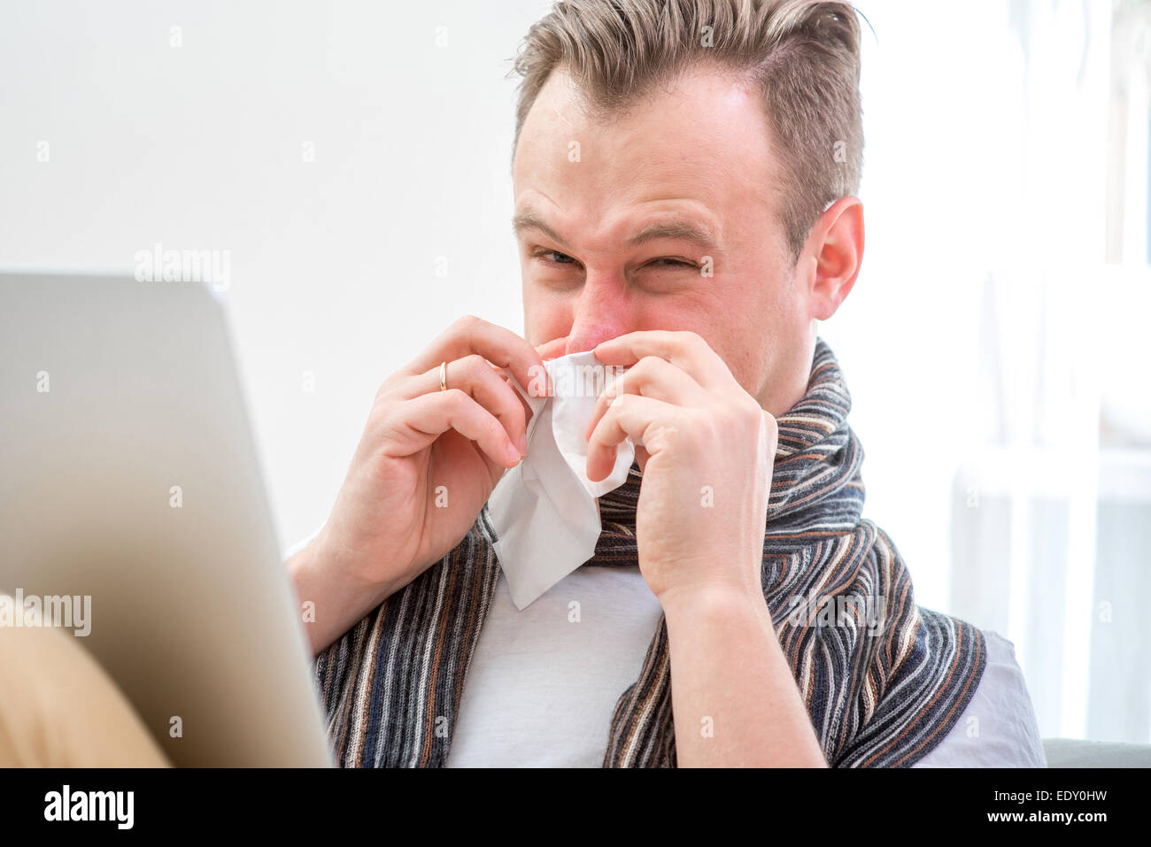 Man catching cold Stock Photo - Alamy