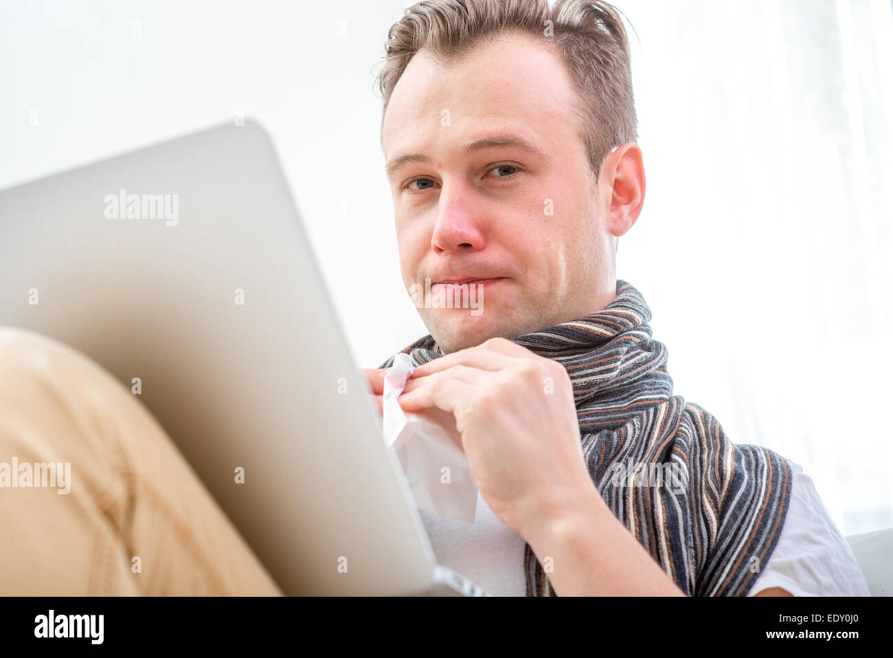 Man catching cold Stock Photo - Alamy
