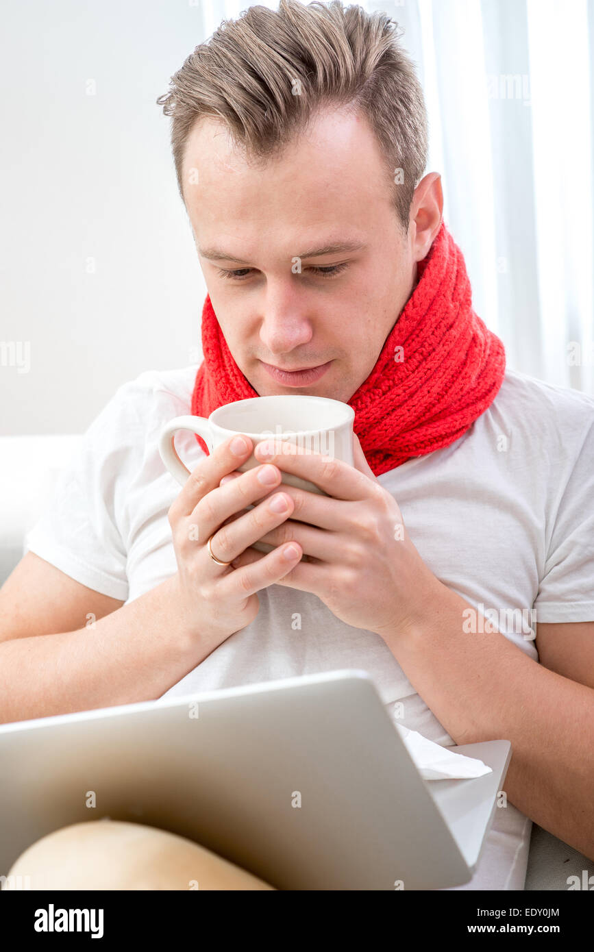 Sick man scarf drinking hi-res stock photography and images - Alamy