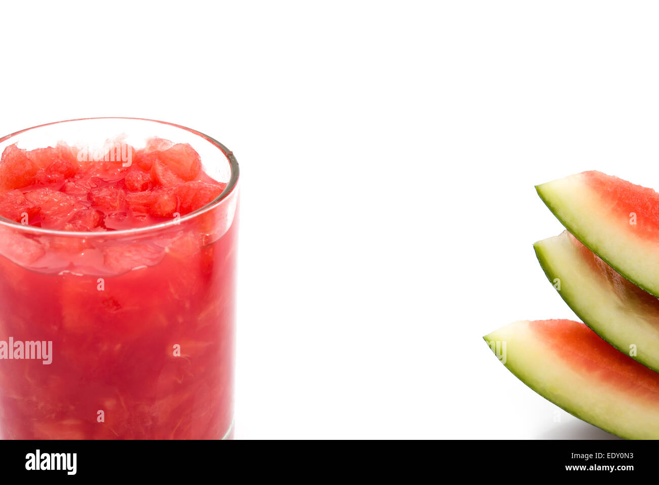 cup of fresh watermelon juice and finished skins on white Stock Photo ...