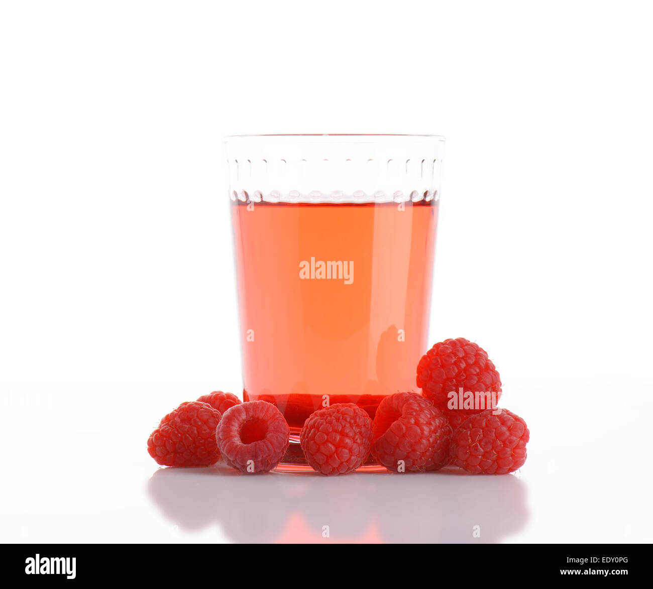 Glass of raspberry-flavored drink and fresh raspberries Stock Photo - Alamy